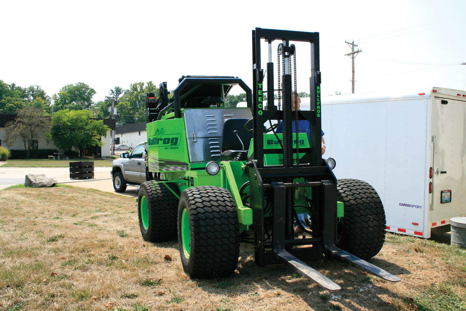 Tractor assists in easy and safe tent set-up - Advanced Textiles ...